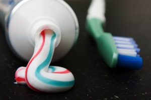 How To Remove Dark Spots Using Toothpaste And Toothbrush